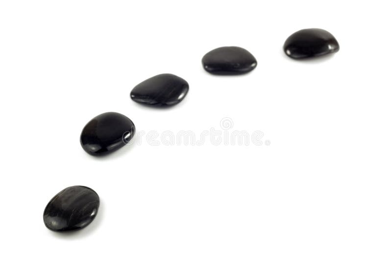 Black Pebbles in a Curved Line Stock Photo - Image of studioshot ...