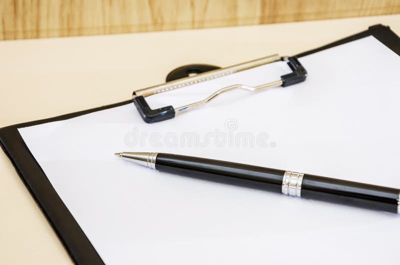 Black Pen on a Blank Sheet of Paper. Close-up. Stock Photo - Image of ...