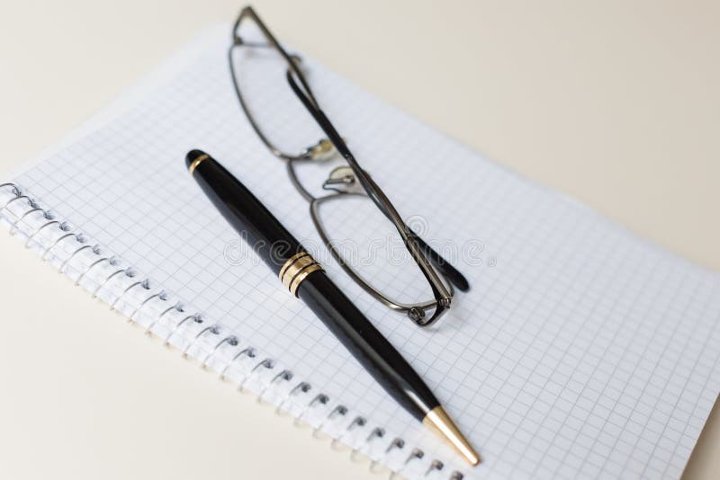 Black Pen and Glasses with White Pad or Notepad Stock Image - Image of ...
