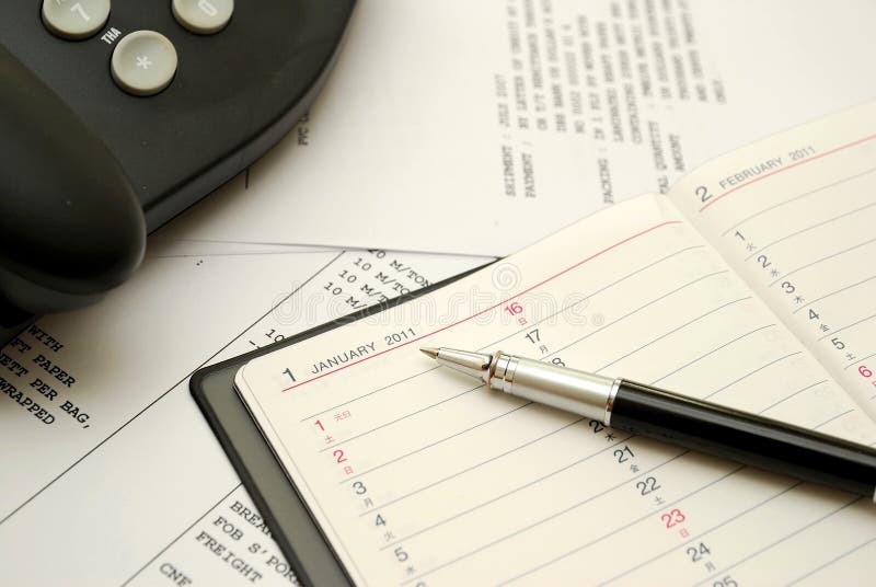 Calendar and pen close-up stock photo. Image of communication - 2214586
