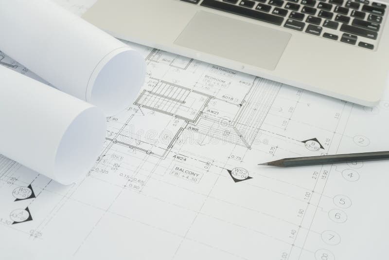 Black Pencil and Computer Laptop on Architectural Drawing Paper ...