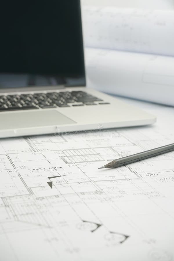 Black Pencil and Computer Laptop on Architectural Drawing Paper Stock ...