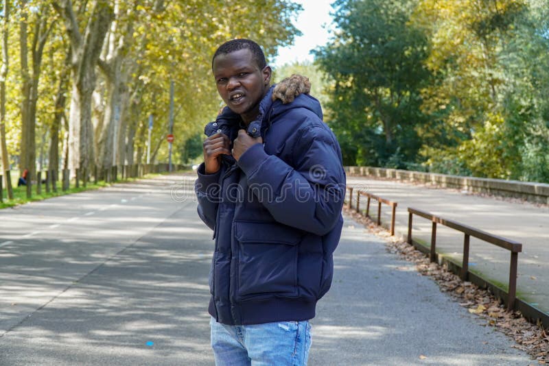 Black People Portrait in a Park with a Coat in the Park in Wintertime ...