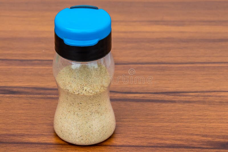 Black Pepper Shaker Isolated on Wooden Background Stock Image - Image ...