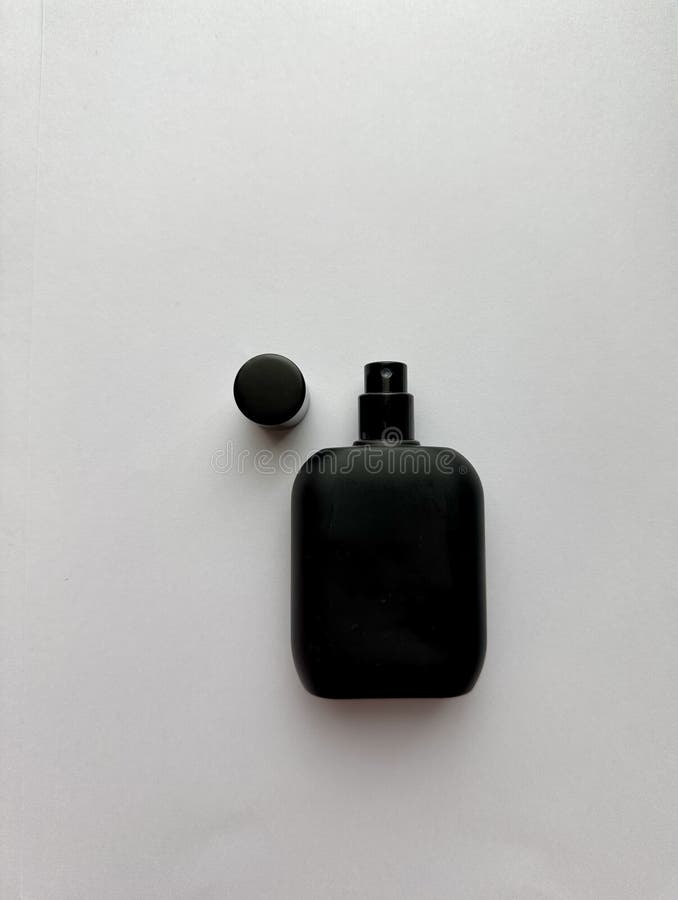 A Black Perfume Bottle with a Matte Finish Placed on a White Background ...