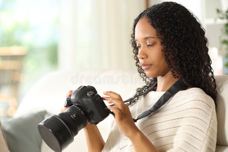 Black Photographer Home Checking Dslr Camera Stock Photos - Free ...