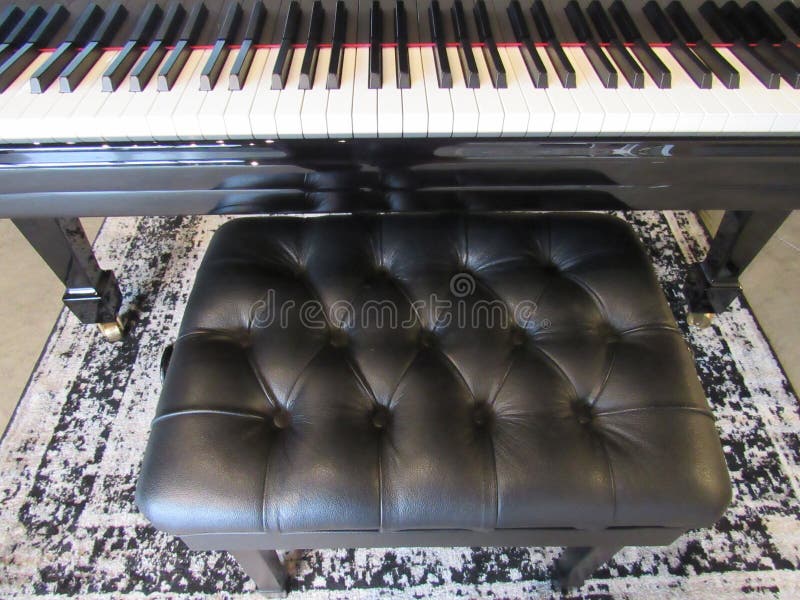 Piano and stool stock photo. Image of iron, musician - 266524162