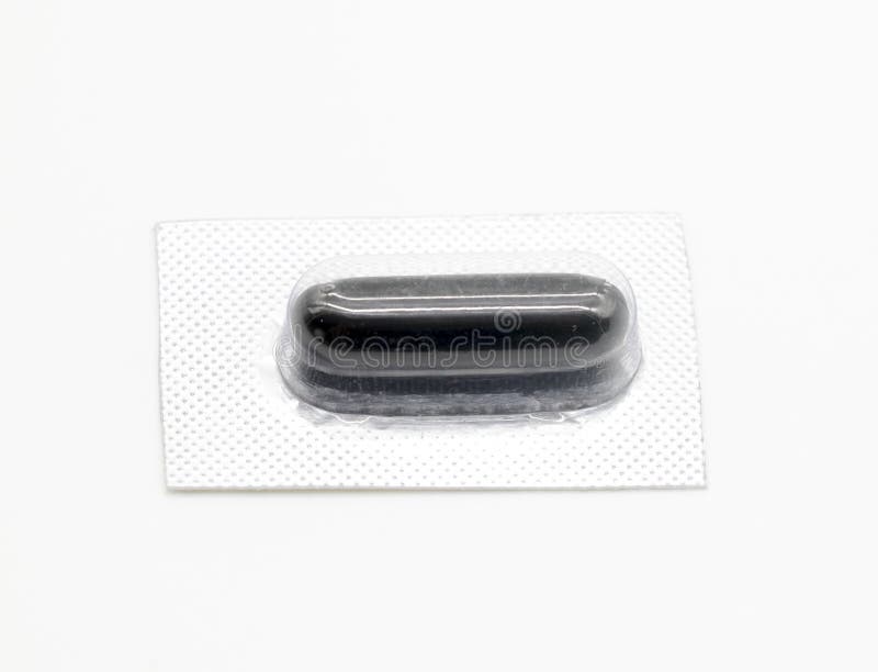 Black Pill Isolate on White Background, Vitamin Pill, Side View Stock ...