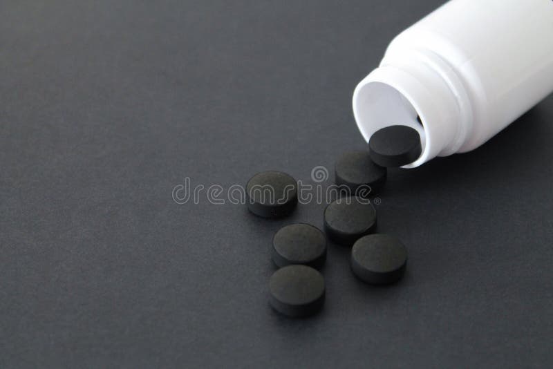 Black pills in pack editorial image. Image of boosting - 182053020