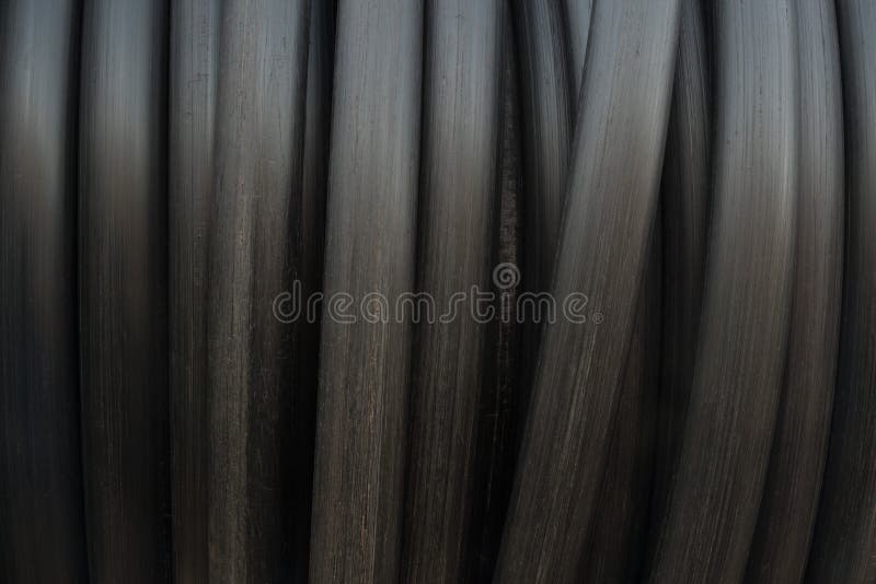 Black Pipe Hose Roll Background and Texture. Stock Image - Image of ...