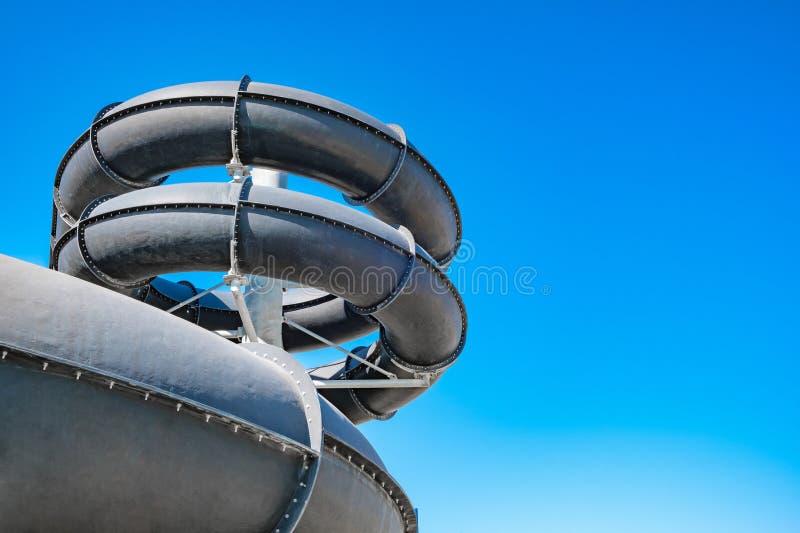 Water Flows Down Black Water Slide in Water Park Stock Photo - Image of ...