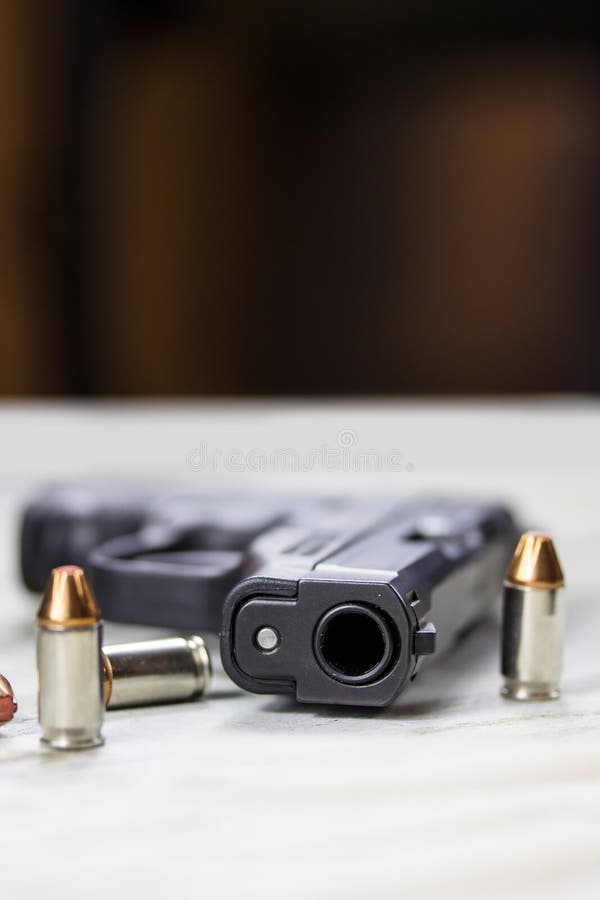 Pistol Handgun and Bullets stock image. Image of firearm - 107118387