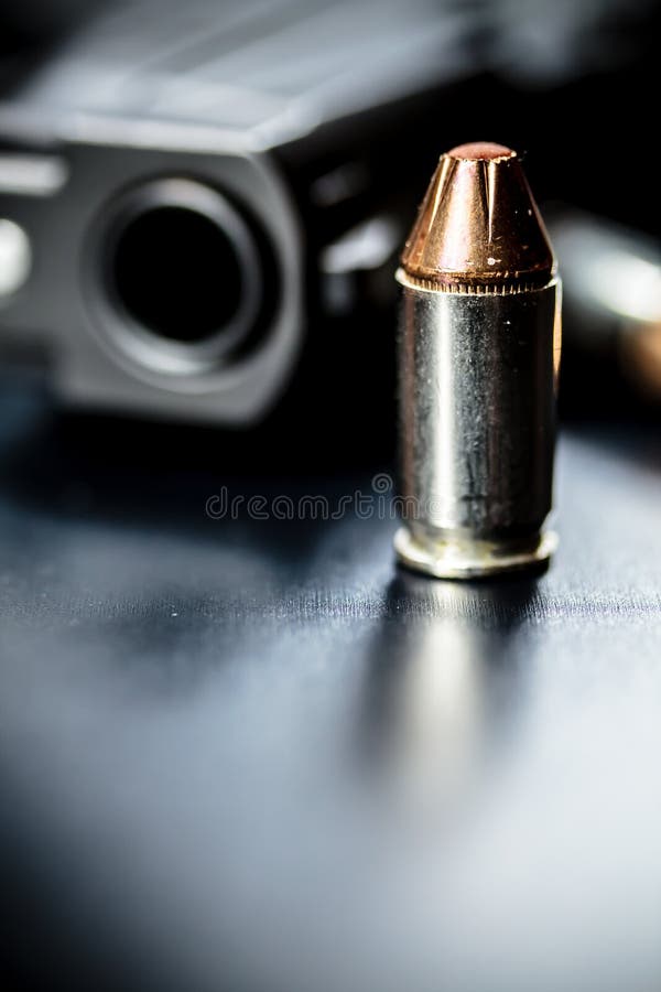 Pistol Handgun and Bullets stock photo. Image of ammo - 107121108