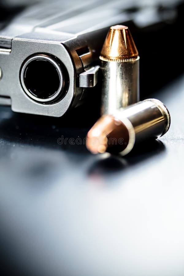 Pistol Handgun and Bullets stock image. Image of copyspace - 107121705