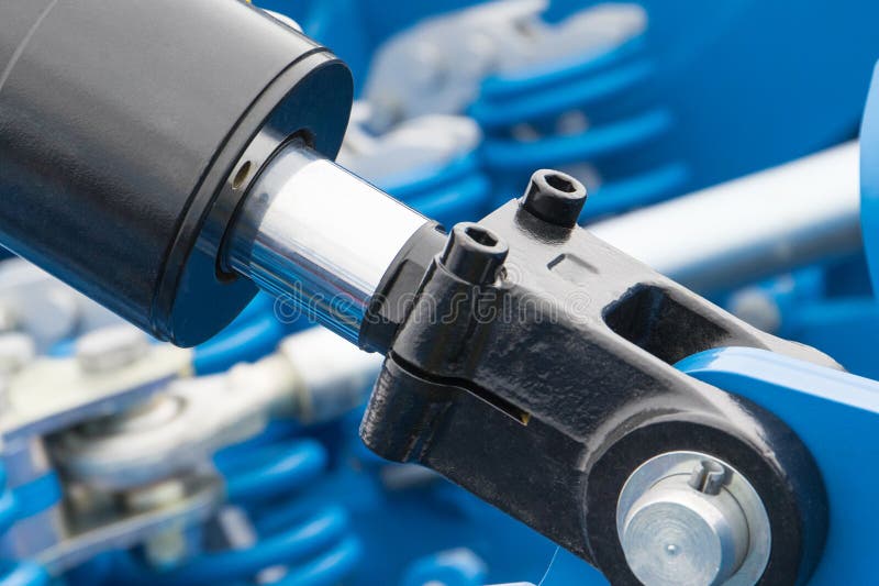 Black Piston or Actuator in Blue Pneumatic or Hydraulic Machine ...