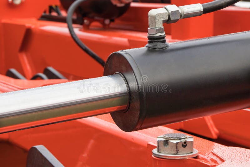 Black Piston or Actuator in Red Pneumatic or Hydraulic Machine ...