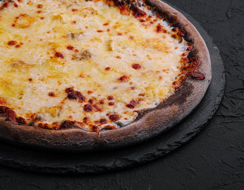 Black Pizza. Made with Cuttlefish and Black Olives. Stock Image - Image ...