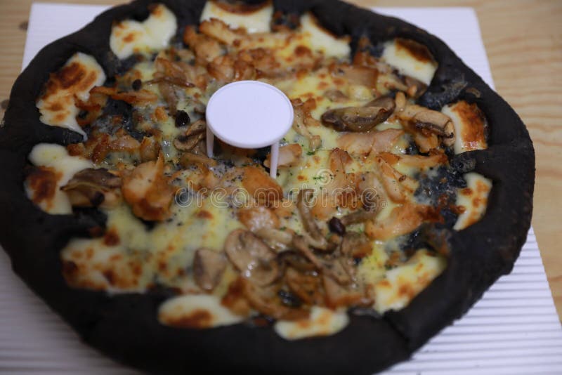 Black Pizza stock image. Image of classic, vegetarian - 106368585