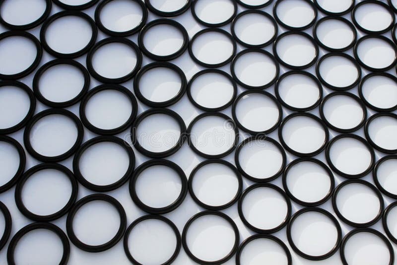 Black, Plastic Circles of the Same Diameter on a White Background Stock ...