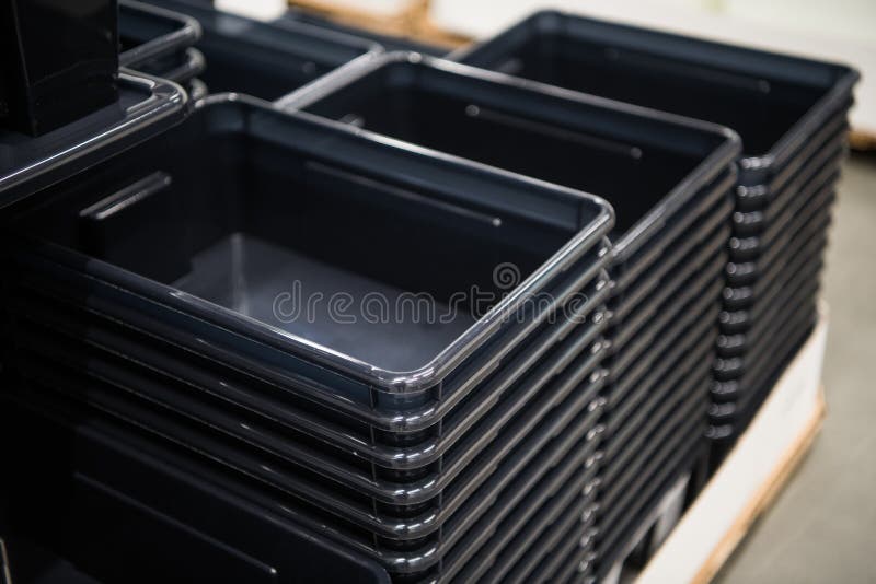 Black Plastic Containers Stack in a Store Stock Image - Image of carry ...
