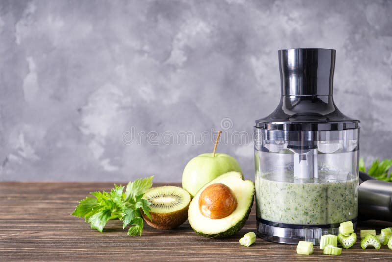 Black Plastic Electrical Hand Blender and Accessories with Fruit on ...