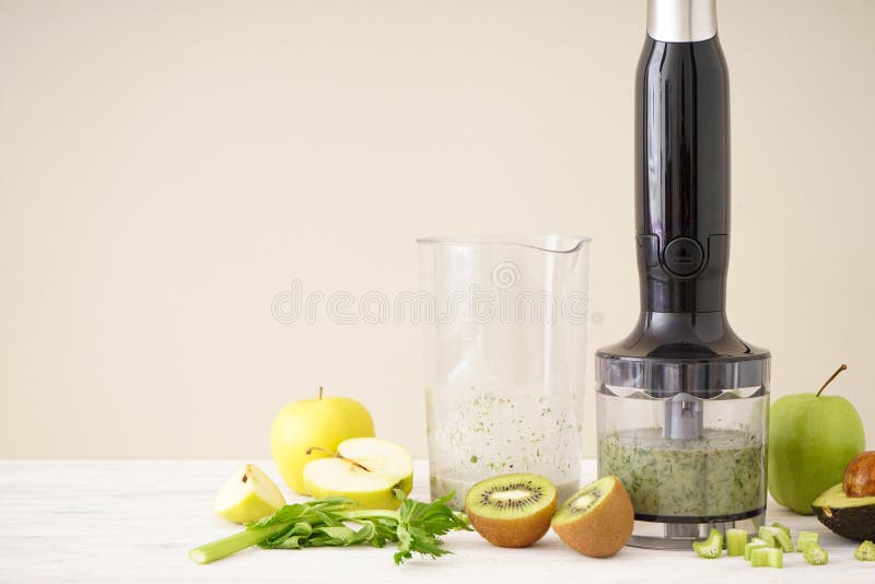 Black Plastic Electrical Hand Blender and Accessories with Sliced Fruit ...