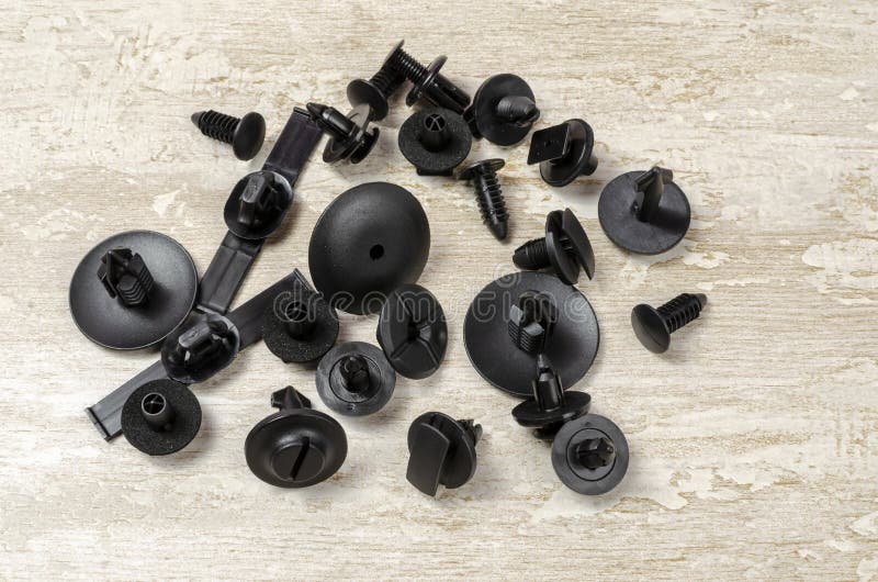 Black Plastic Fastener on a Light Background Stock Image - Image of ...