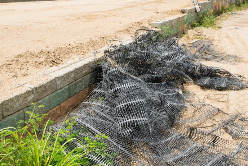 Black Plastic Mesh Retaining Walls, Concrete Cubes Stock Photo - Image ...