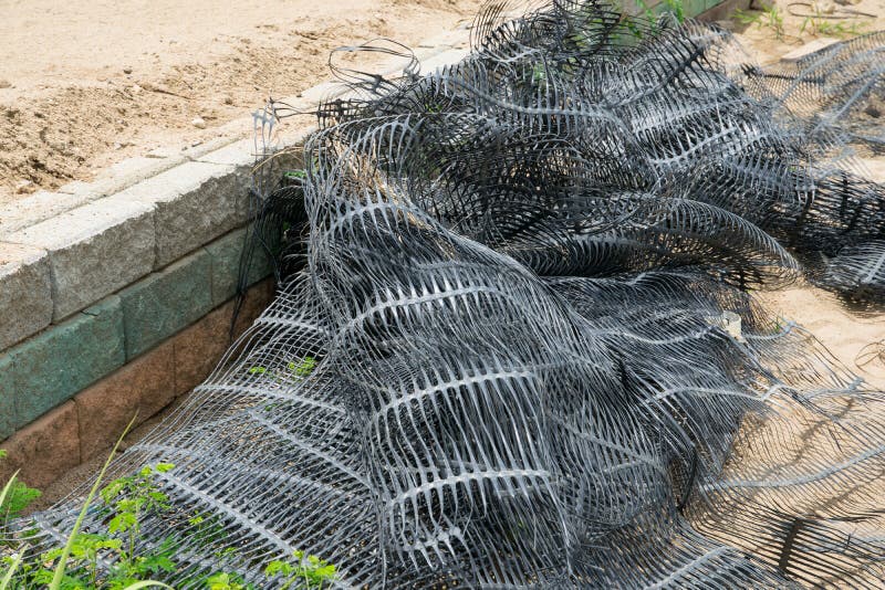 Black Plastic Mesh Retaining Walls, Concrete Cubes Stock Photo - Image ...