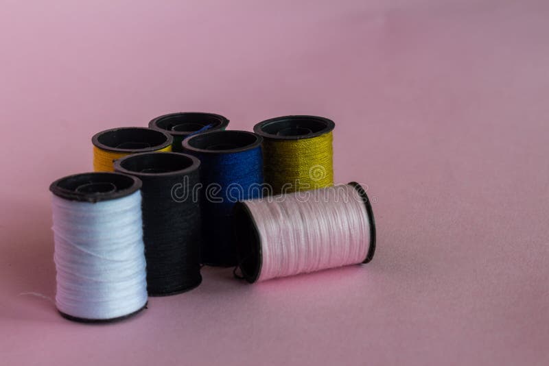 Plastic spools of thread stock image. Image of sewing - 29921759