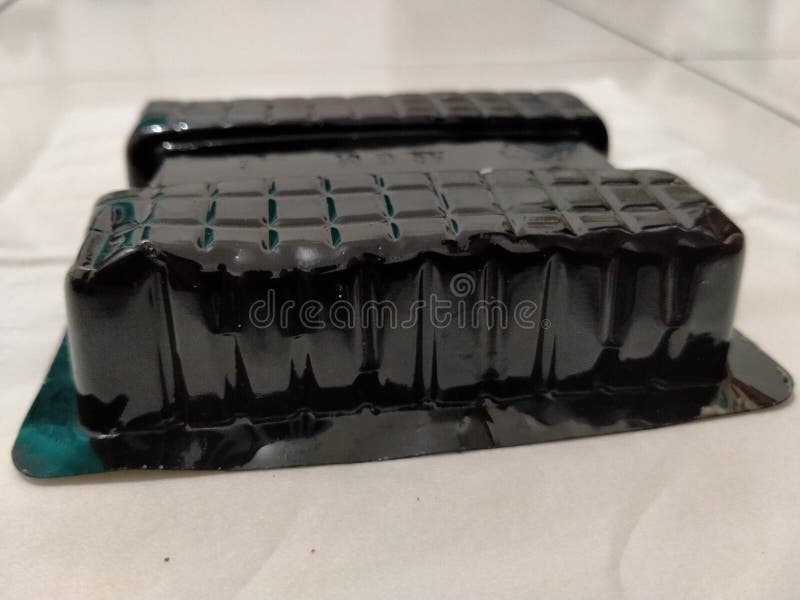 Black plastic wafer sticks stock image. Image of tire - 271666635