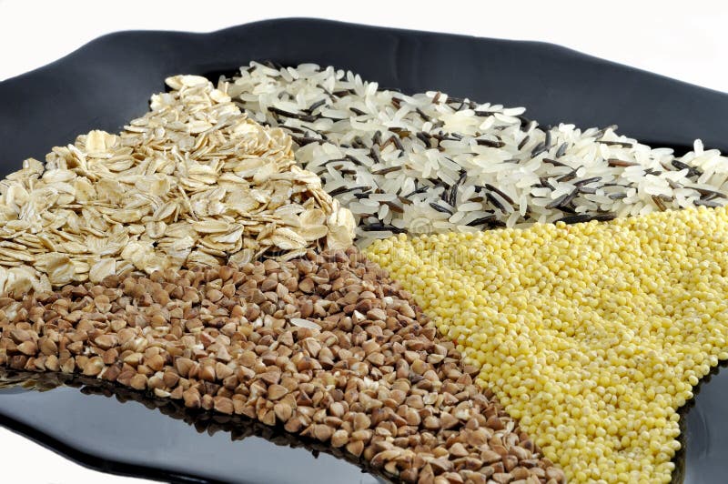 Black Plate with Rice, Buckwheat, Millet, Porridge Stock Image - Image ...