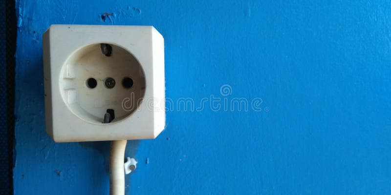 , Black Plug in Electric Socket on Wall. Stock Image - Image of ...