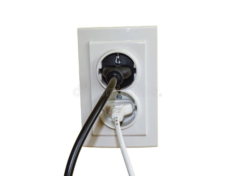 A Black Plug and a White Plug in the Socket Stock Photo - Image of ...