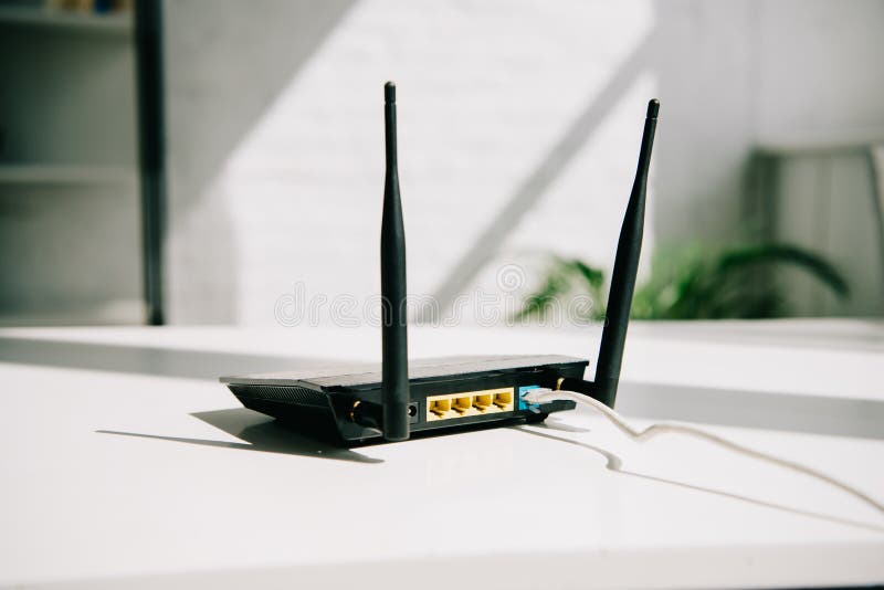 Black Plugged Router on White Office Table Stock Image - Image of ...