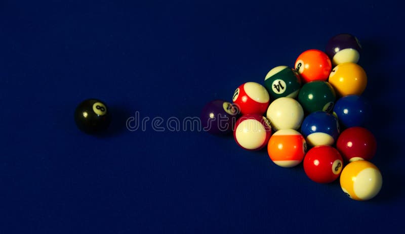 Black Pool Ball and a Group of the Rest of Balls Stock Photo - Image of ...