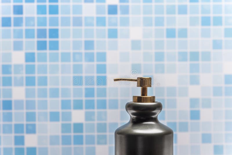 A Black Porcelain Container with a Dispenser for Hand Washing Soap ...