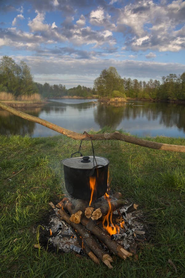 Black pot over campfire stock image. Image of travel - 95914719