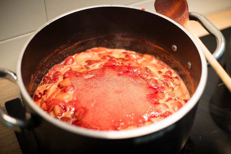 Black Pot with Strawberry Jam Boiling during Preparation Stock Photo ...