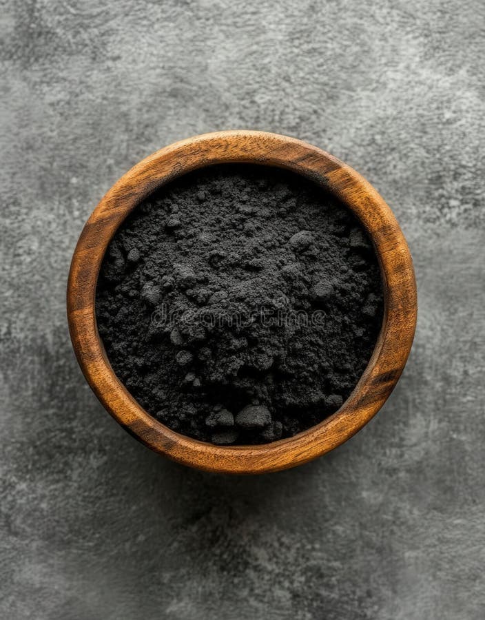Black Powder in Wooden Bowl on Grey Background, Top View Stock Photo ...