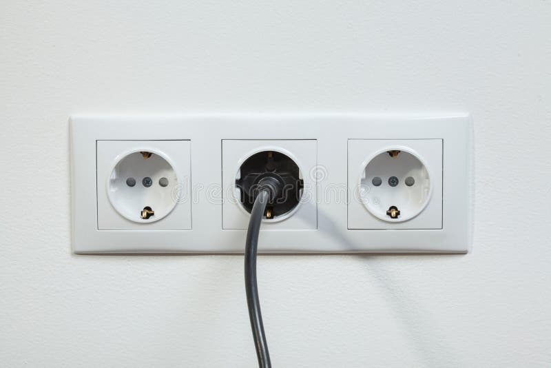 Black Power Plug Plugged in a Electric Socket Stock Image - Image of ...