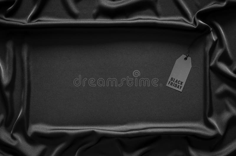 A Black Price Tag on Black Smooth and Wavy Cloth Stock Image - Image of ...
