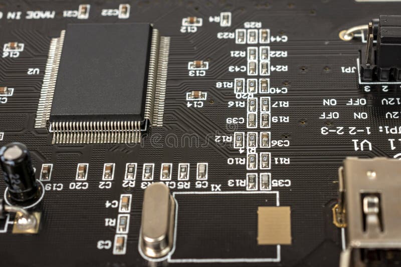Black Printed Circuit Board with Microcircuits and Radio Components ...