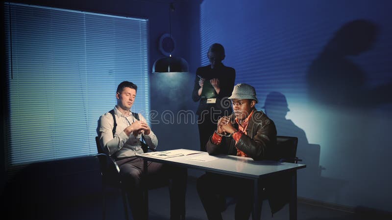 Police Detective Questioning Suspect Black Man in Interrogation Room ...