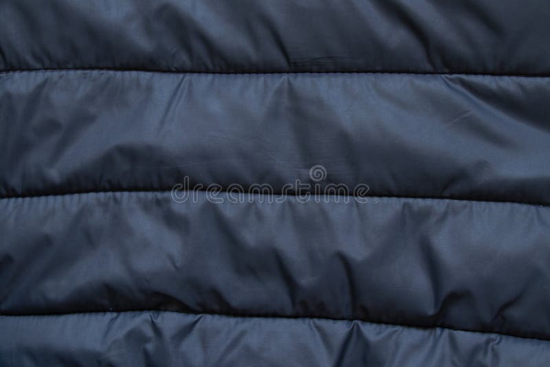 Black Puffer Jacket Material As Background Closeup Stock Image - Image ...