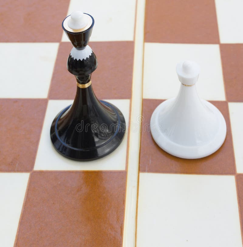 Black quinn and white pawn stock image. Image of game - 39600313