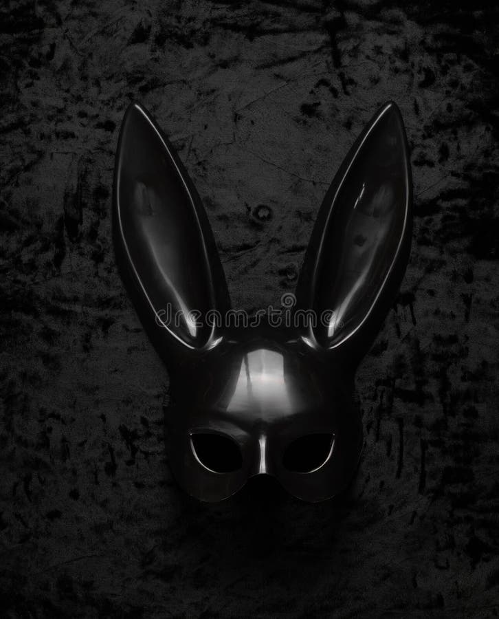 Black rabbit mask on black stock image. Image of masquerade - 295729401