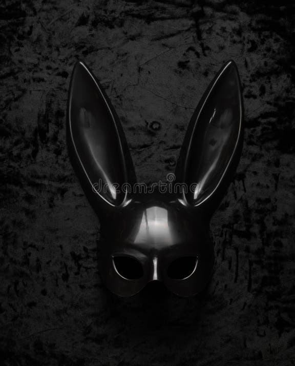 Black rabbit mask on black stock image. Image of masquerade - 295729401