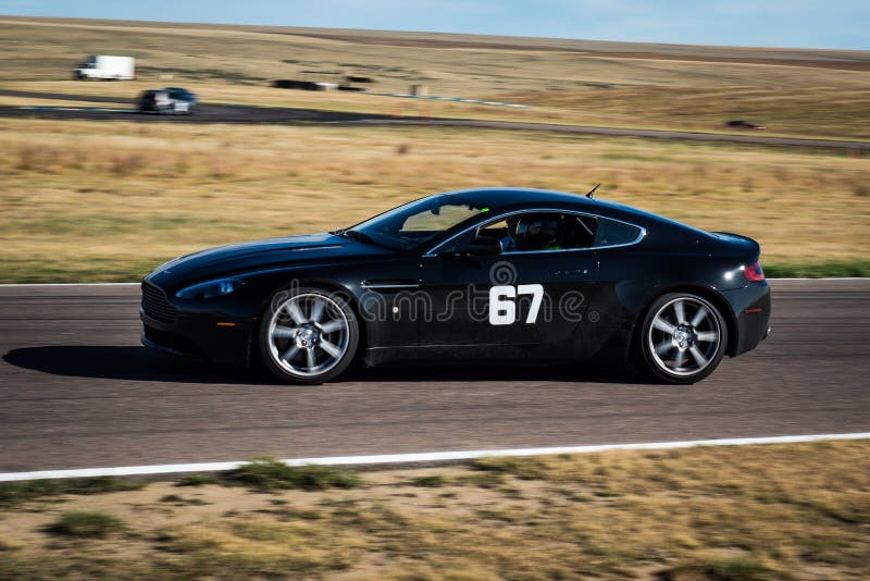 Black race car on track editorial photography. Image of black - 102124542