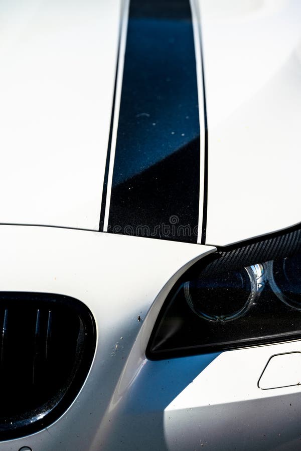 Black Racing Stripes on the Hood of a White Car.. Stock Image - Image ...